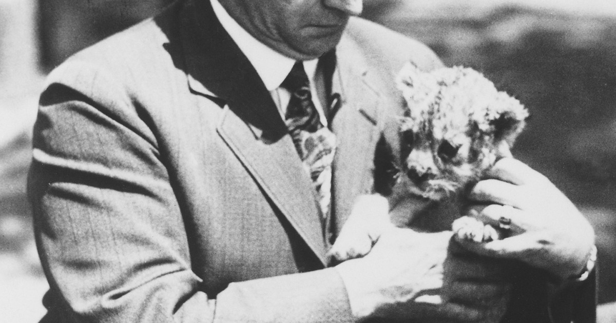 Dr. Harry M. Wegeforth and lion cub | San Diego Zoo 100